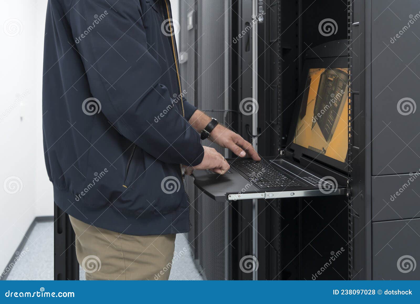 Close Up on Data Center Engineer Hands Using Keyboard on a ...