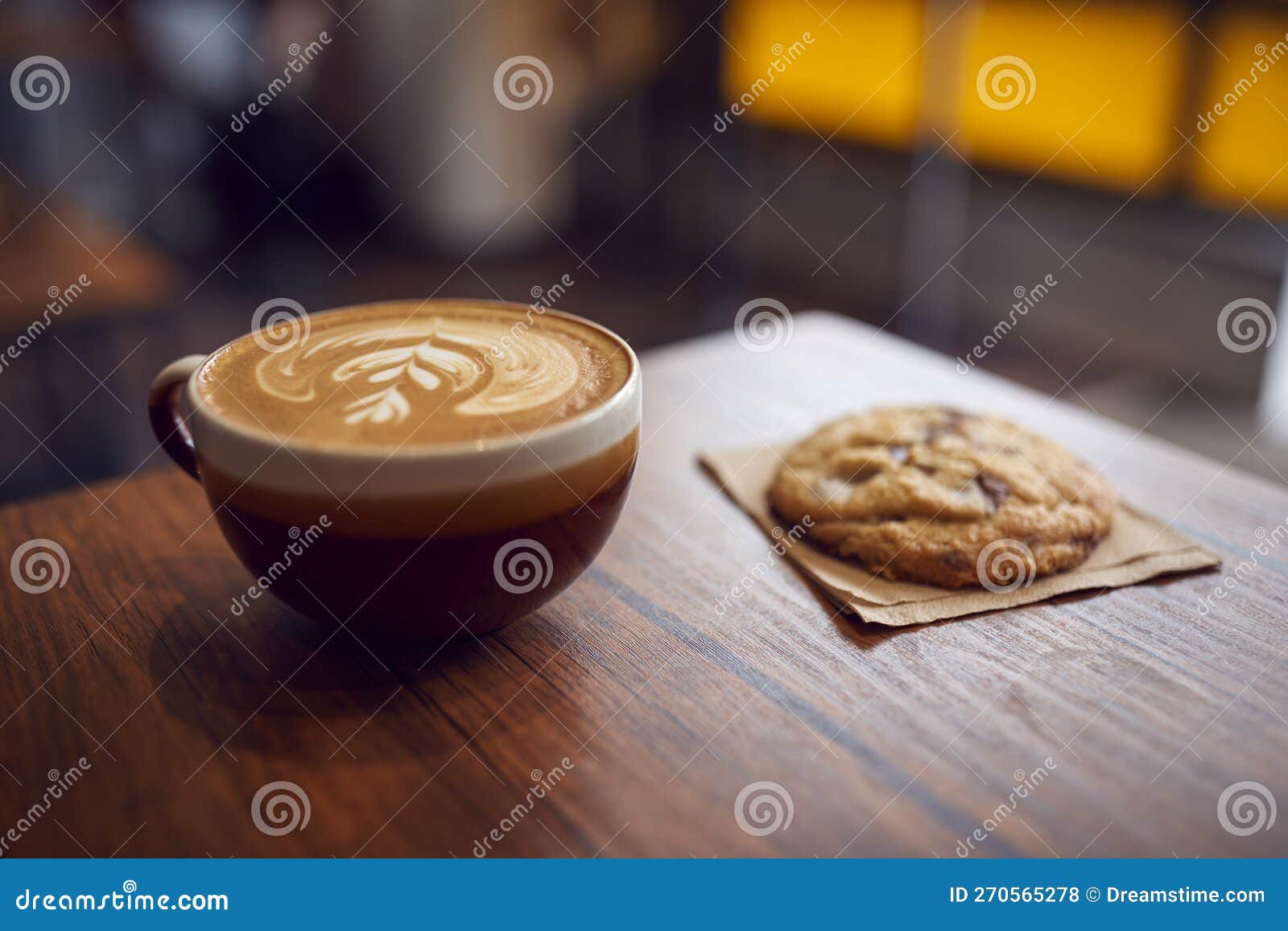 Close Up of Decorated Coffee and Cookie on Table in Coffee Shop Stock ...