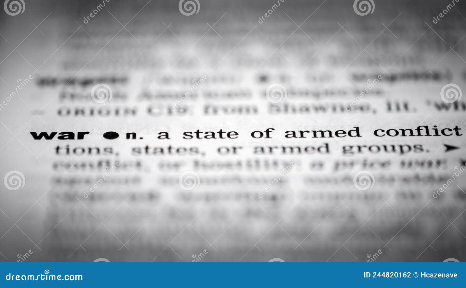 Close-up on the Definition of the Word `War` in an English Dictionaryh ...