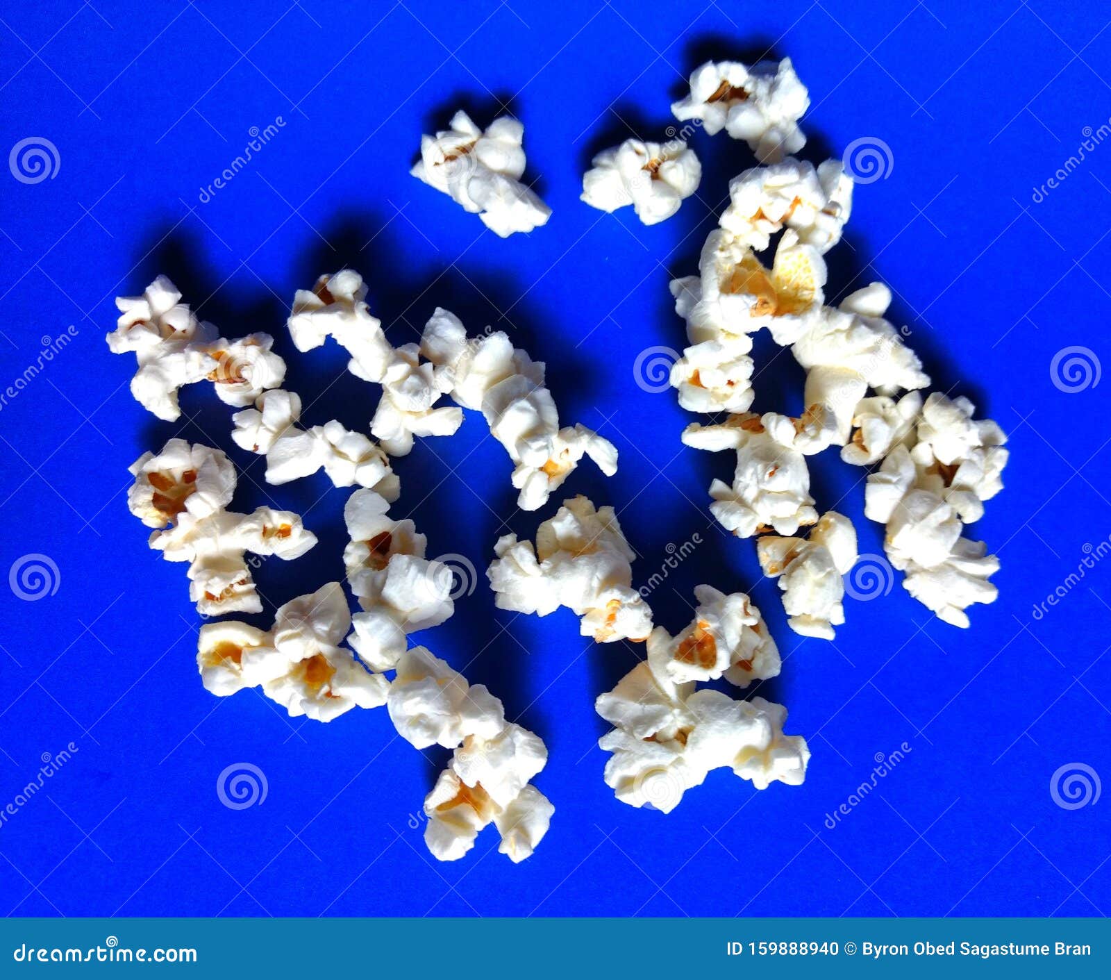 Close-up of Delicious Popcorn on Blue Background Stock Photo - Image of ...