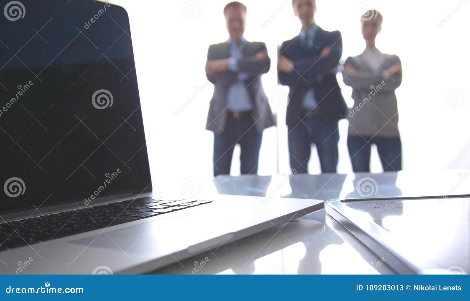 Close Up of Desktop Computer on the Background of Business Team Stock ...