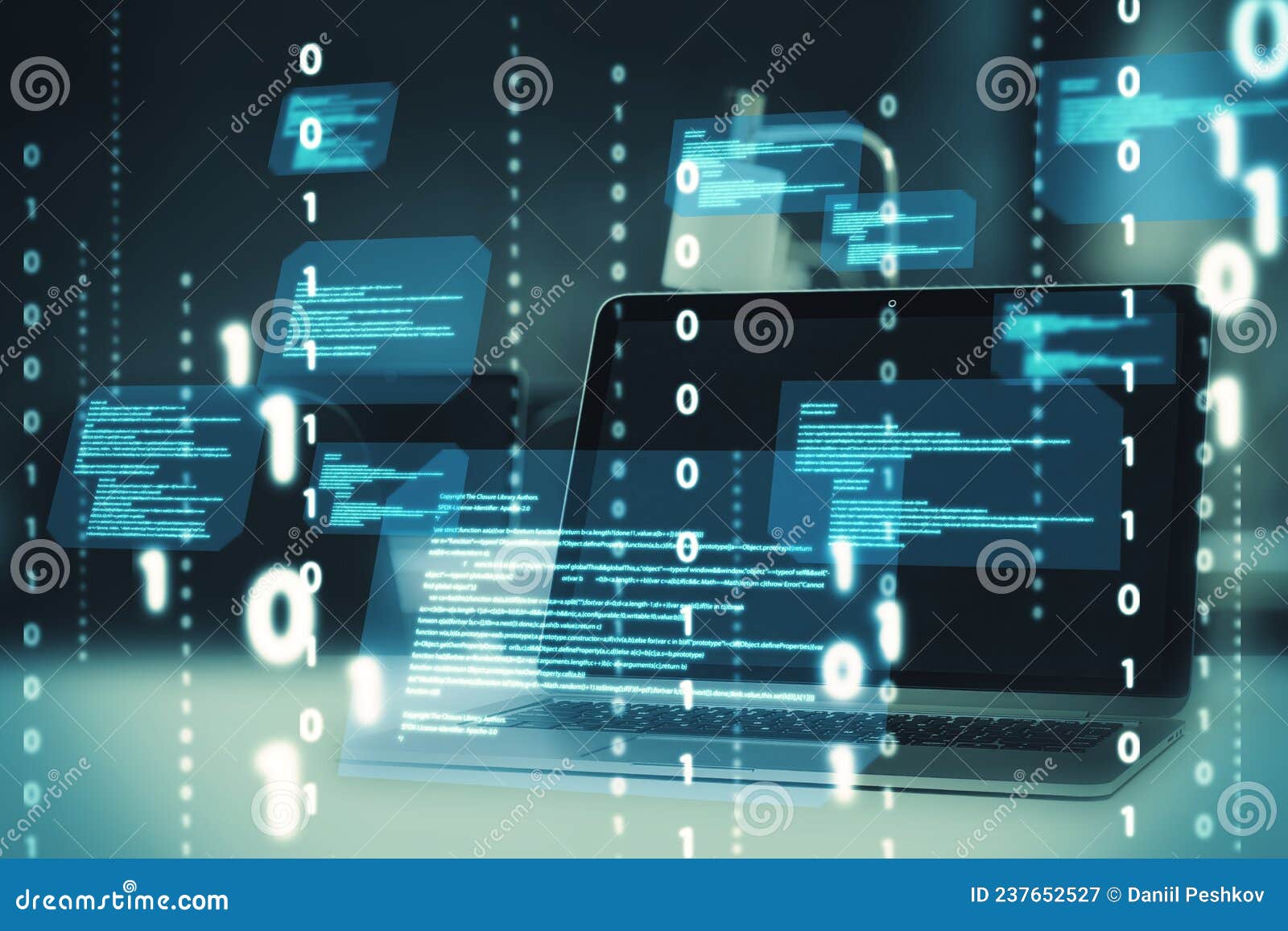 Close Up of Desktop with Laptop Computer and Abstract Coding Binary ...