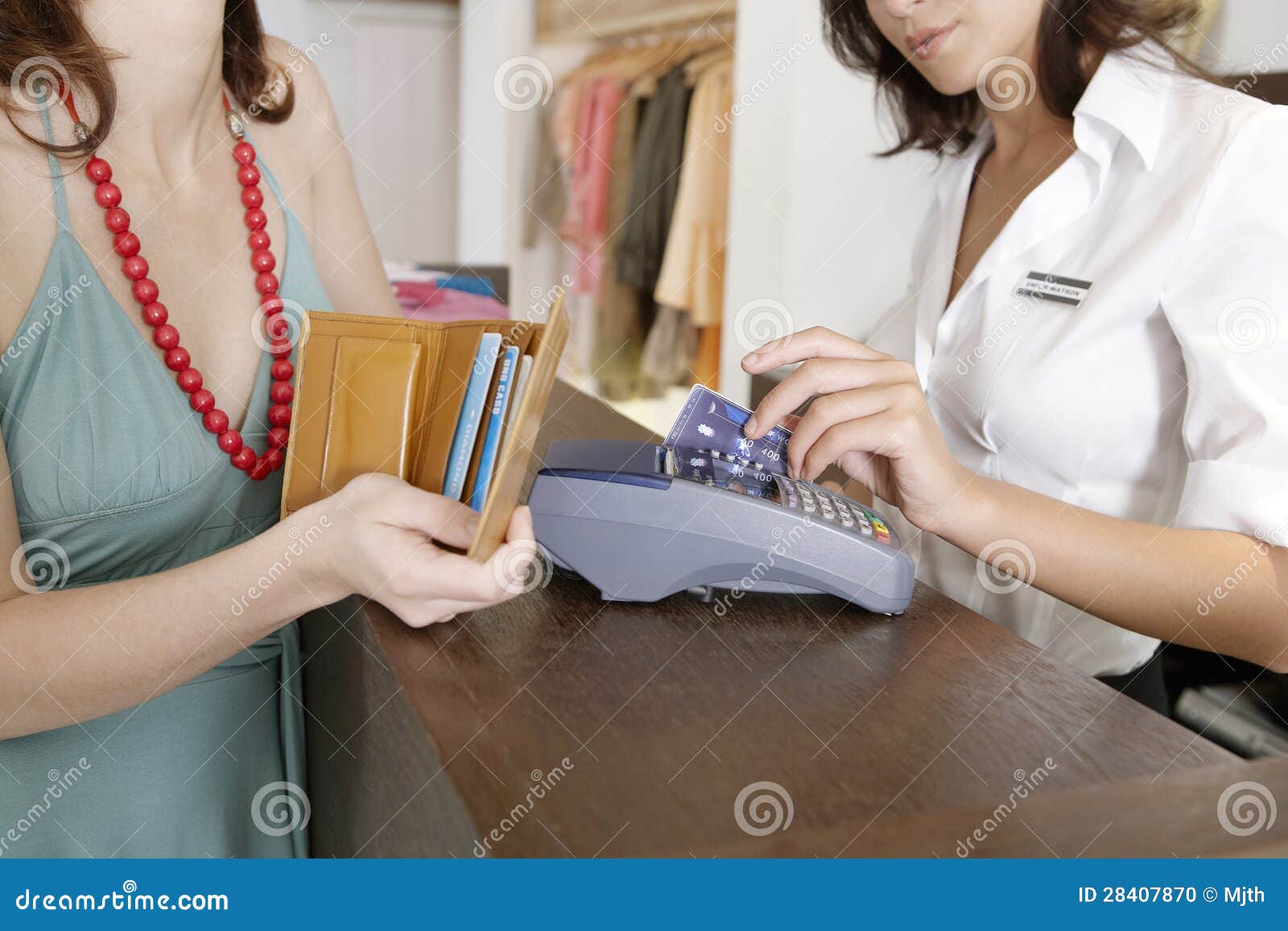 Close Up Detail of Client Making Payment by Counter Stock Photo - Image ...