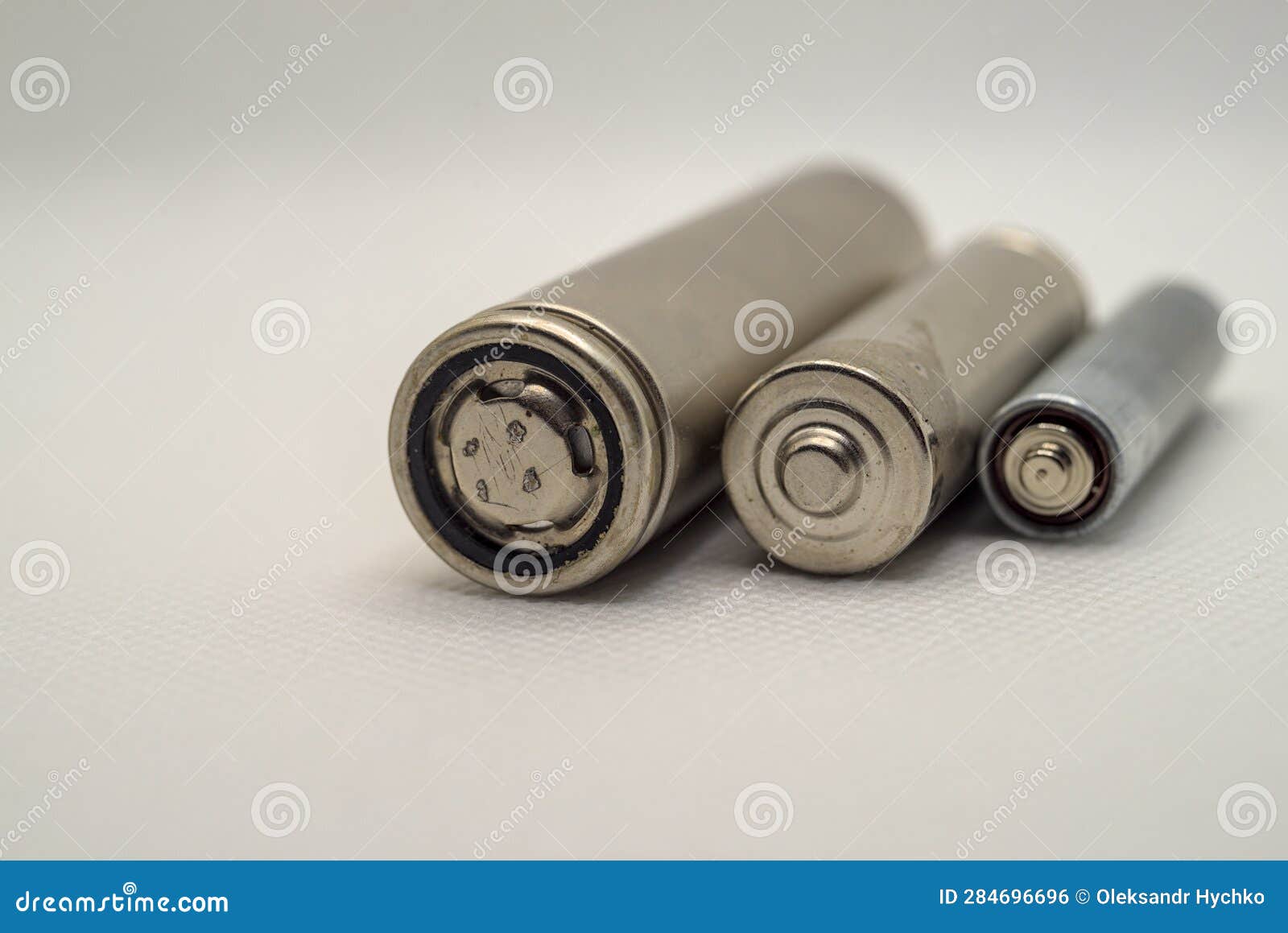 Close Up Detail of a Group of Three Batteries Stock Photo - Image of ...