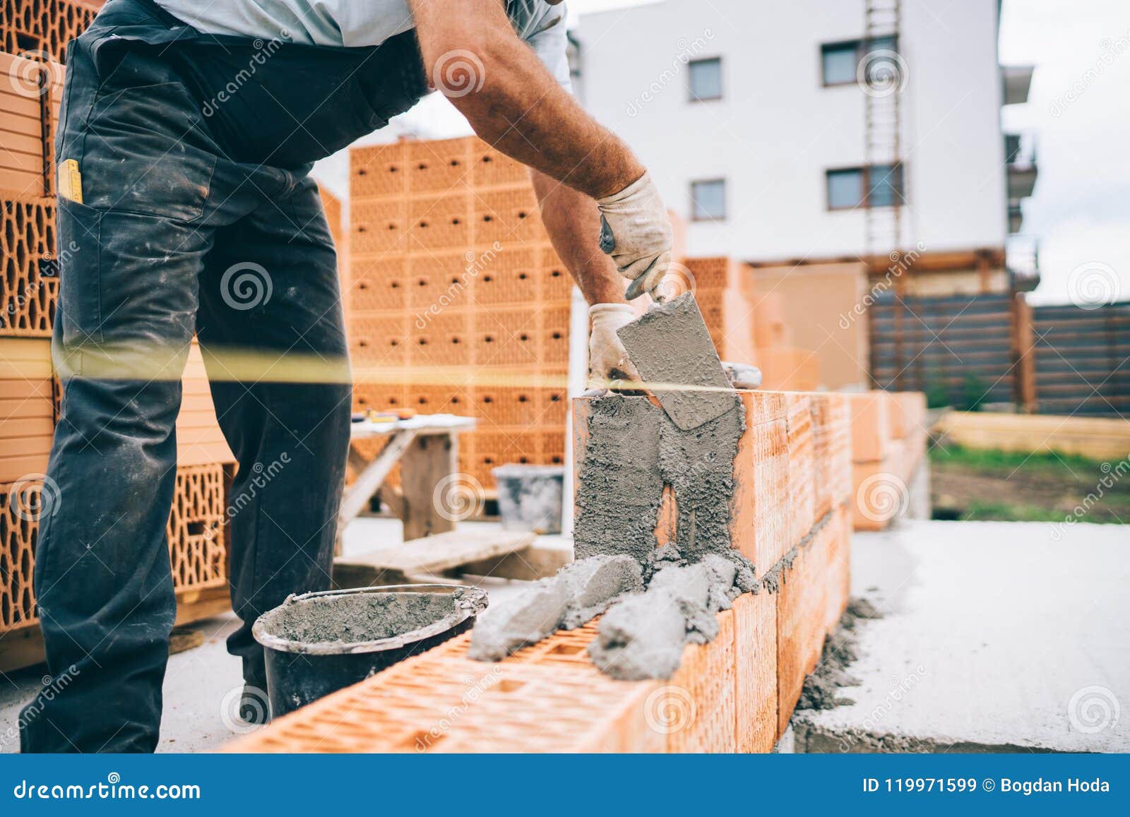 Details of Industrial Bricklayer Installing Bricks on Building ...