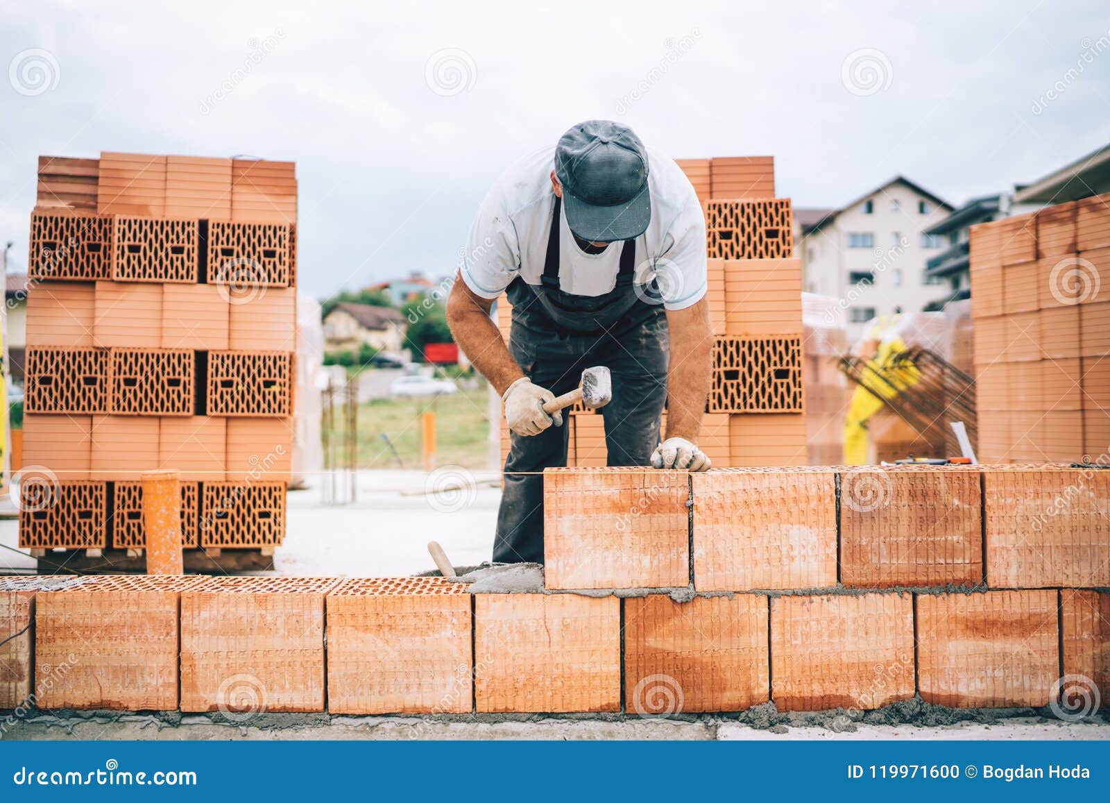 Details of Industrial Bricklayer Installing Bricks on Construction Site ...