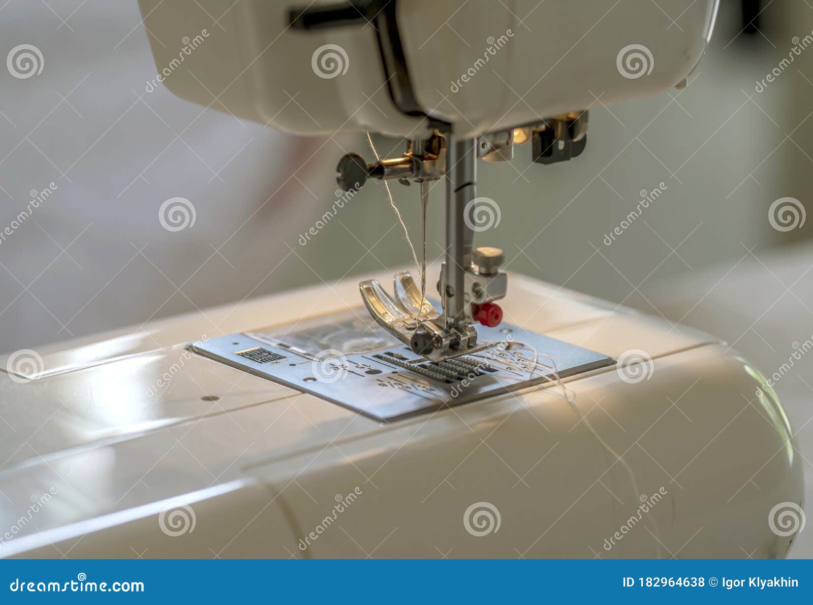 Close-up Details of a Sewing Machine, a Carriage and a Sewing Needle ...