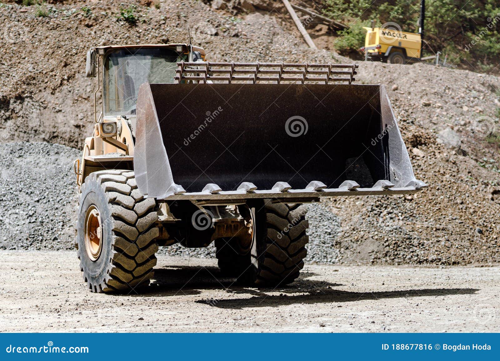Details of Wheel Loader with Empty Scoop and Bucket Working on ...