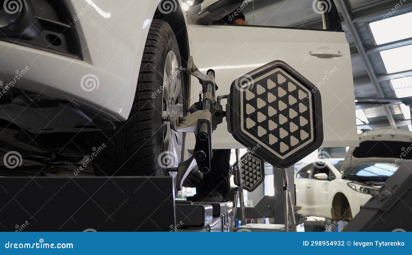 Close-up Diagnostics and Balancing of Wheels on a Lift at a Service ...