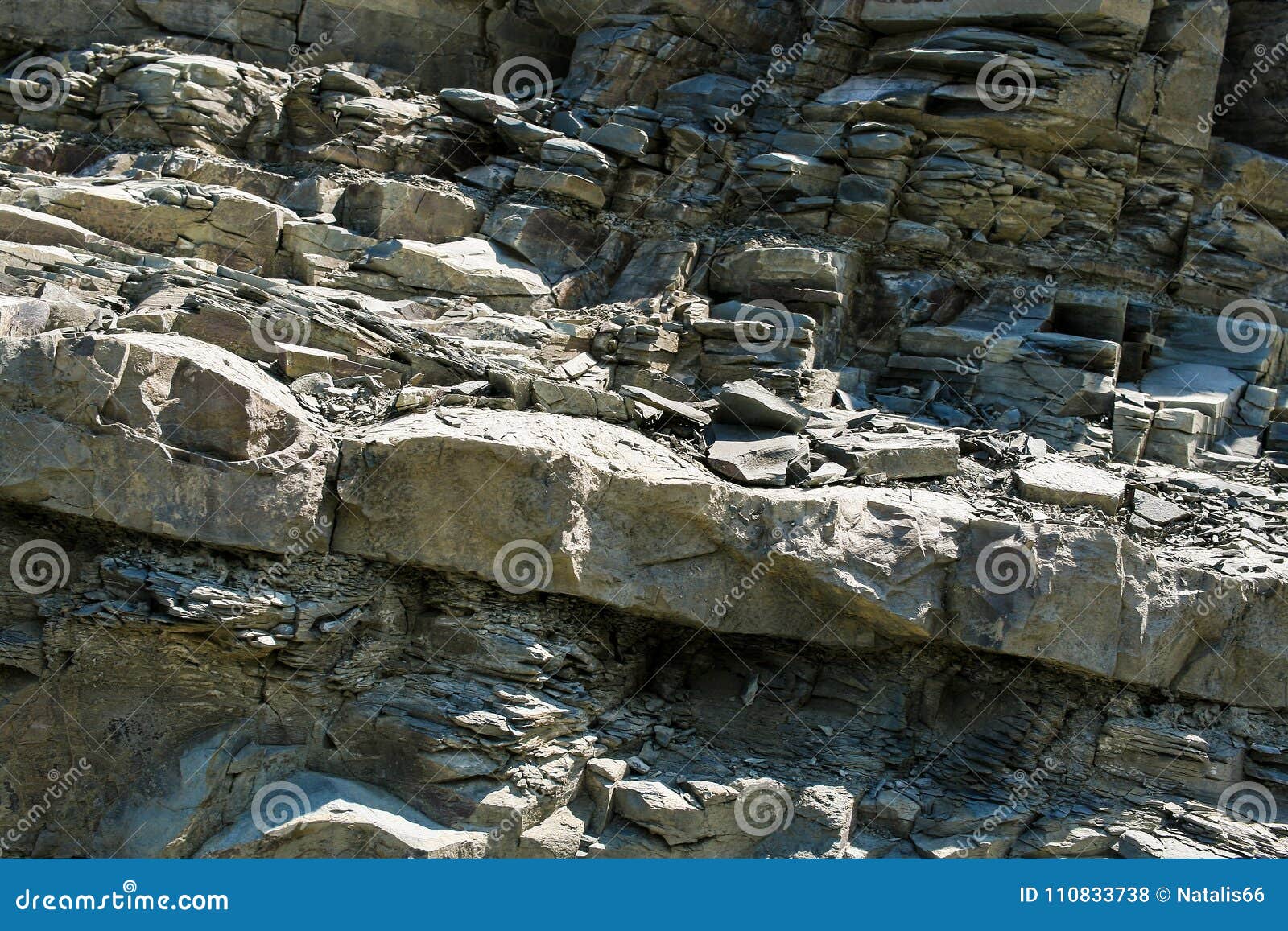 Close-up Diagonal Layered Rock Formation with Large and Small Stones ...