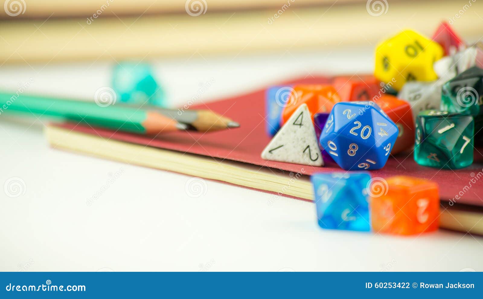 Close Up of Dice with Pencils on a Notebook Stock Photo - Image of note ...