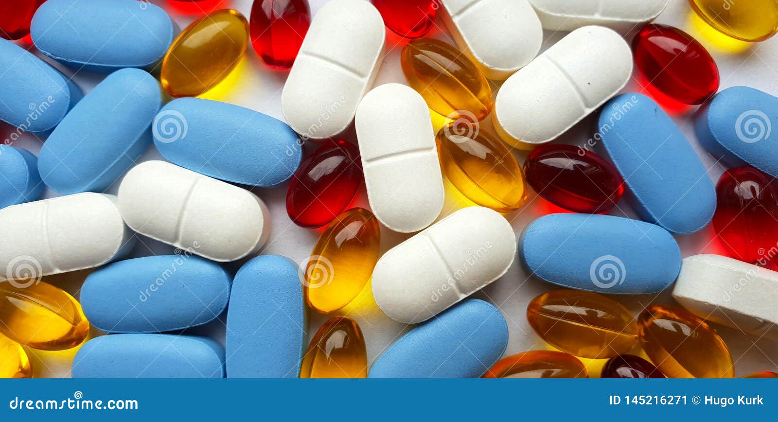Colored pills close-up stock image. Image of illness - 145216271