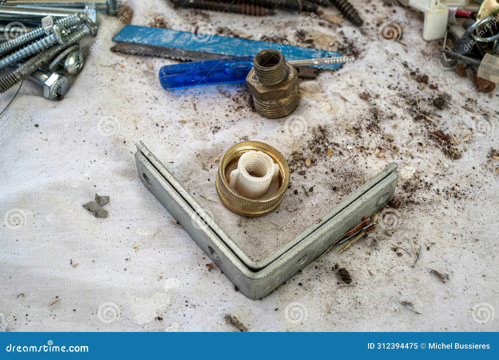 Piles of Bolts Tools Angles and Different Hardware on a Drop Sheet ...