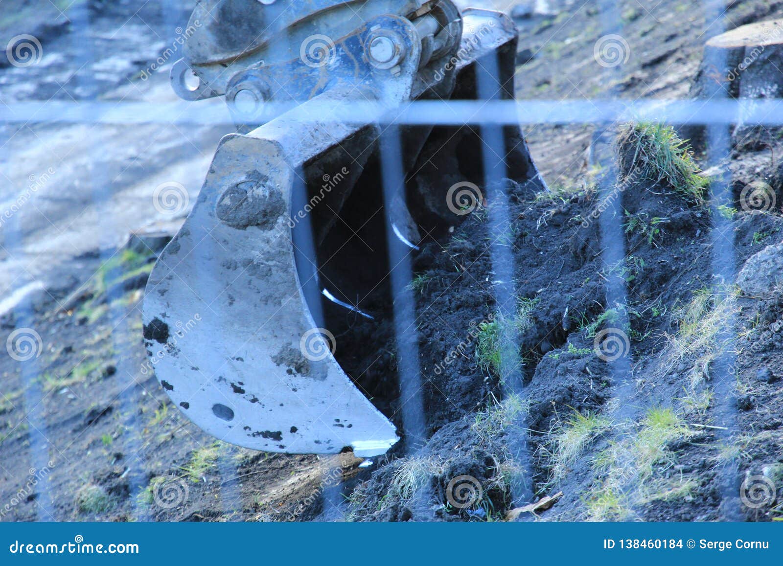 Close up of Digger at Work stock photo. Image of turf - 138460184