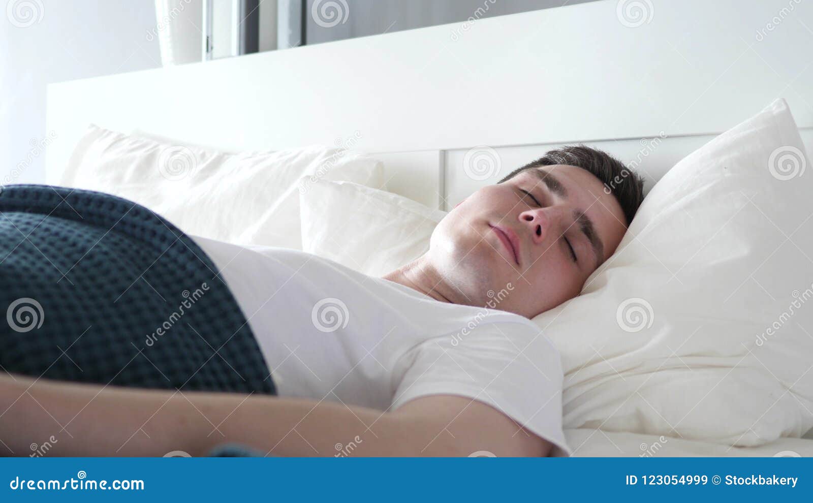 Close Up of Disturbed Man Sleeping in Bed Stock Image - Image of young ...