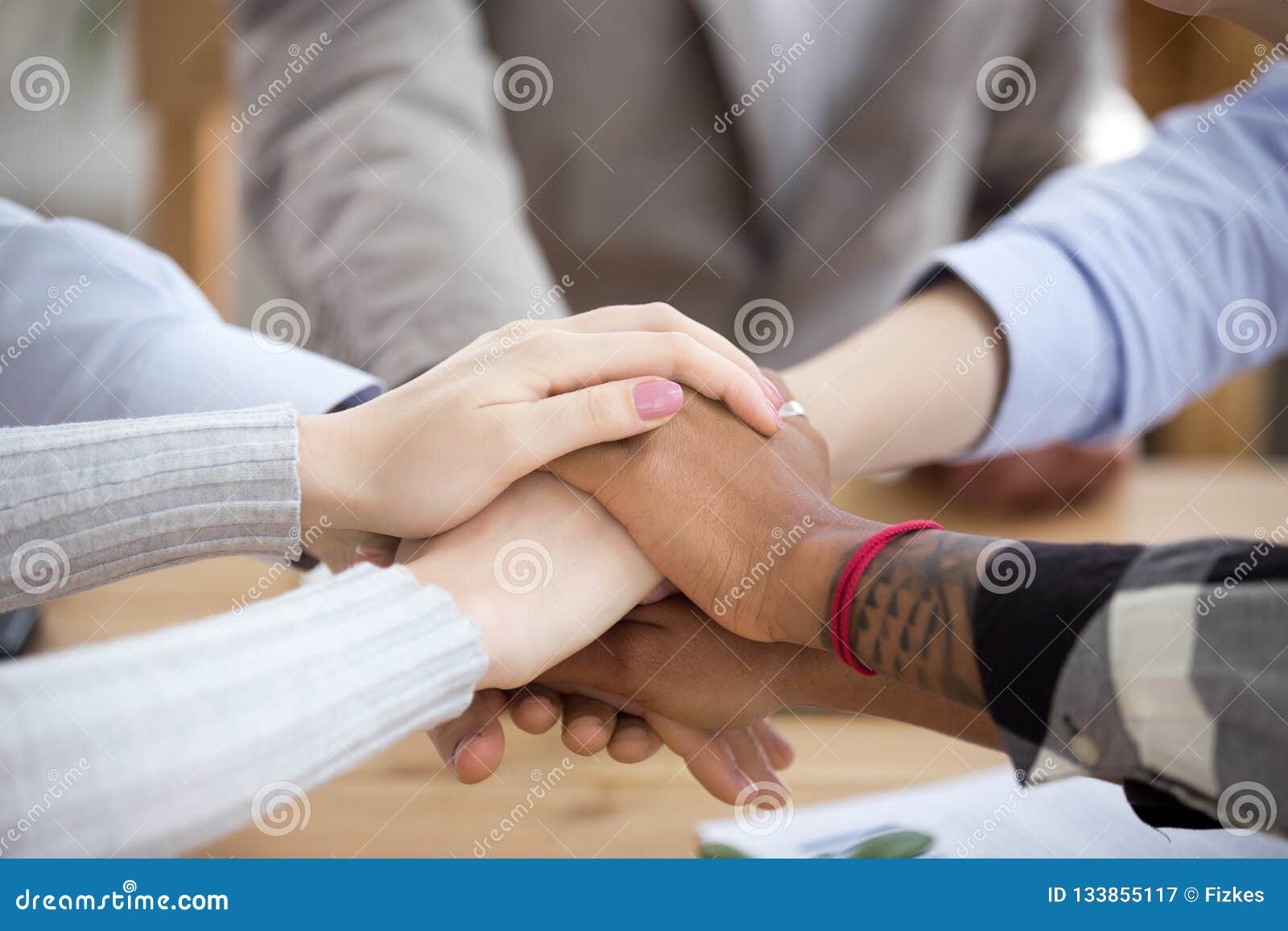 Close Up of Diverse People Join Hands in Stack Together Stock Image ...