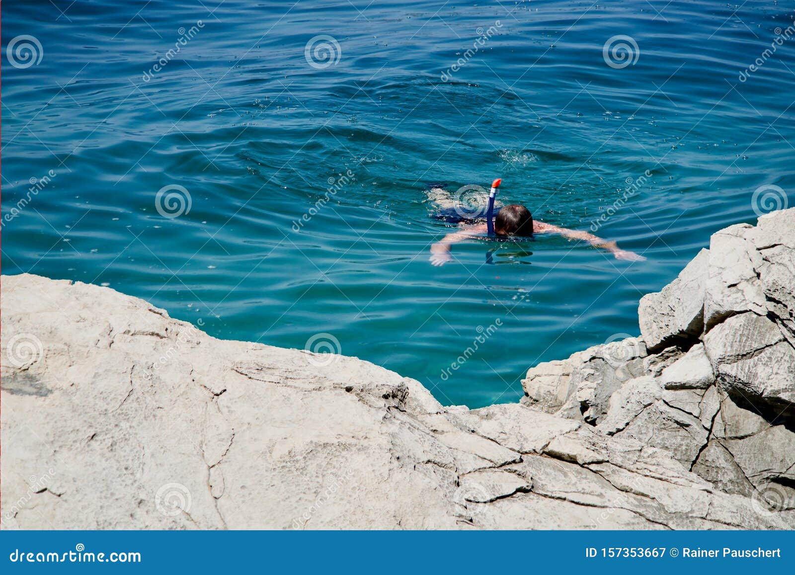 Diving Person in Front of a White Cliff Stock Image - Image of green ...