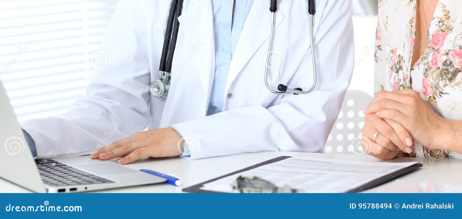 Close Up of a Doctor and Patient Sitting at the Table, Just Hands Stock ...