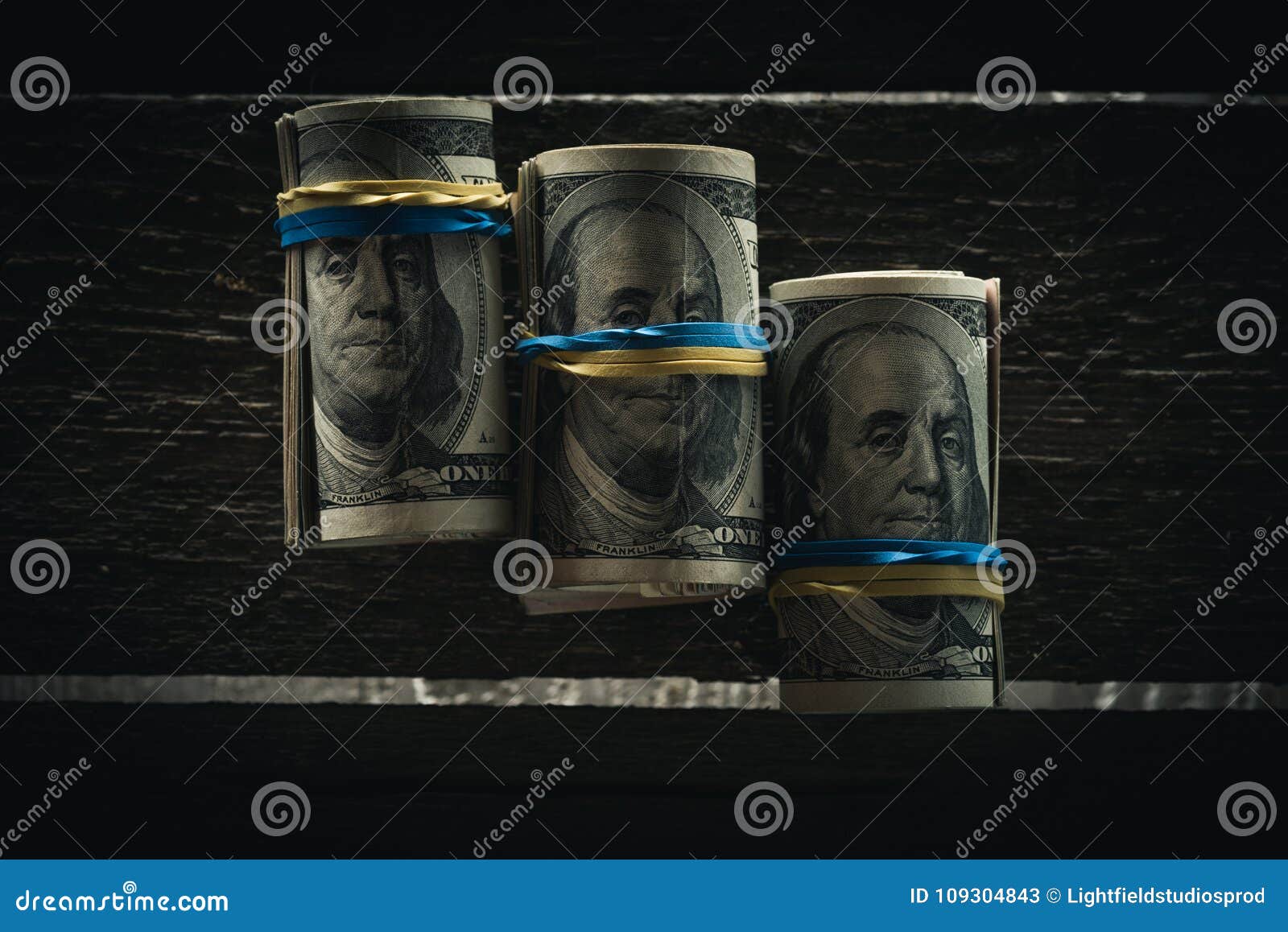 Dollar banknotes in rolls stock image. Image of money - 109304843