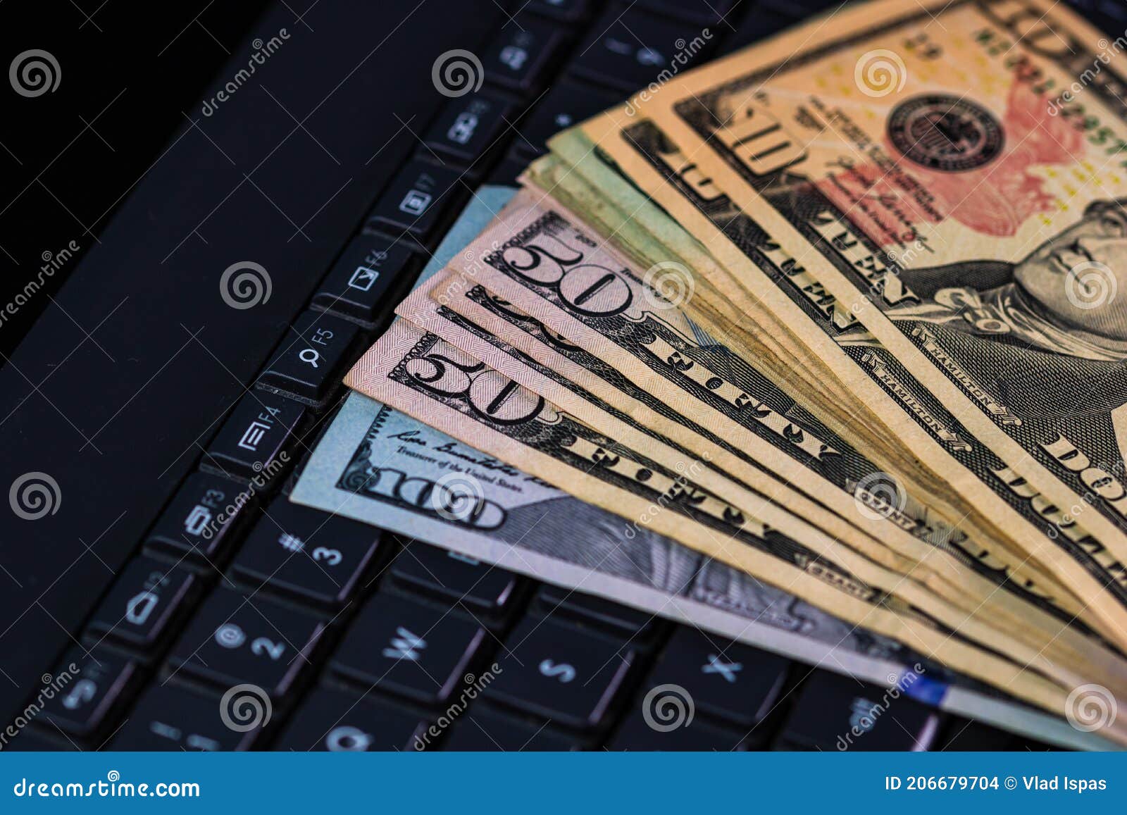 Close Up of Dollars Money on Keyboard Isolated Stock Photo - Image of ...
