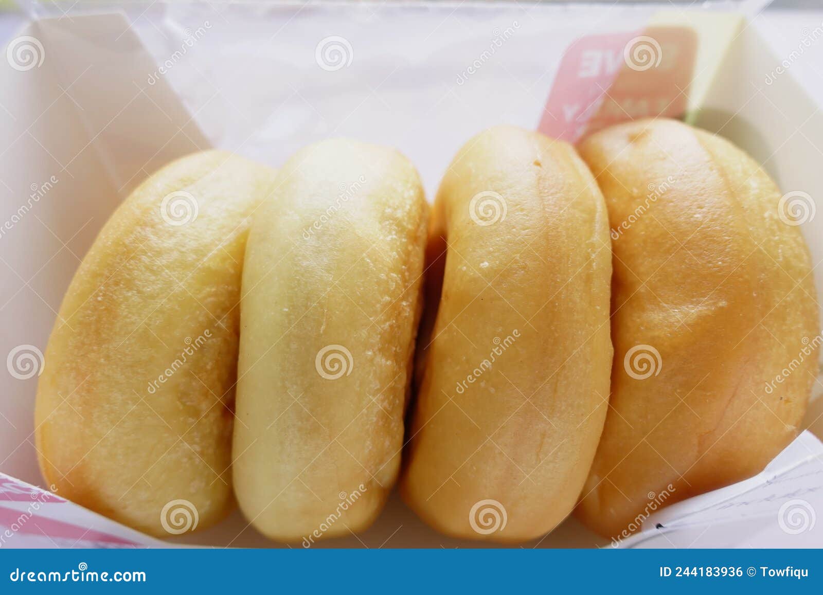 Close Up of Donuts in a Take Away Packet on Table Stock Photo - Image ...