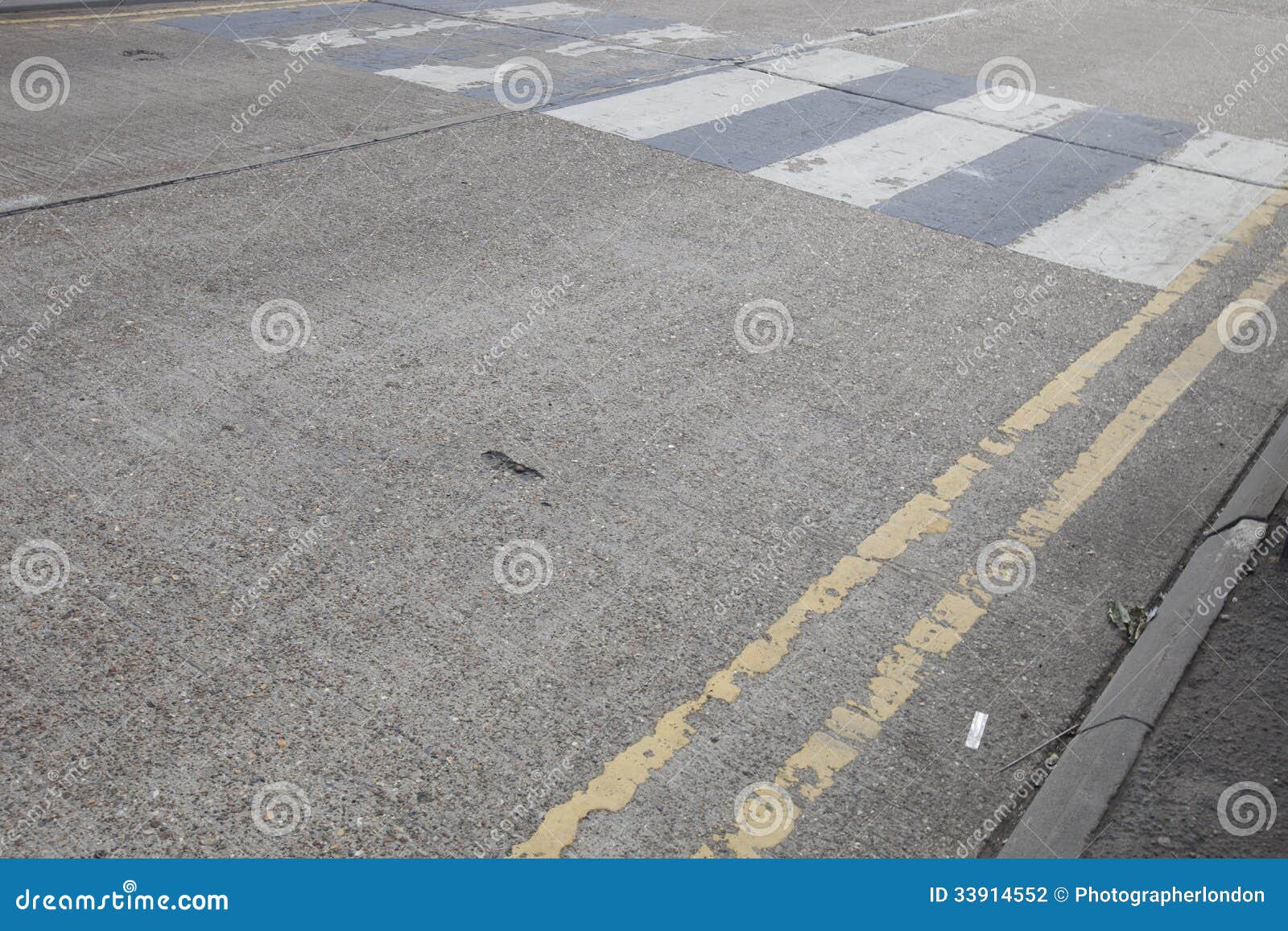 Close-Up of Double Yellow Line on Road and Zebra Crossing Stock Photo ...