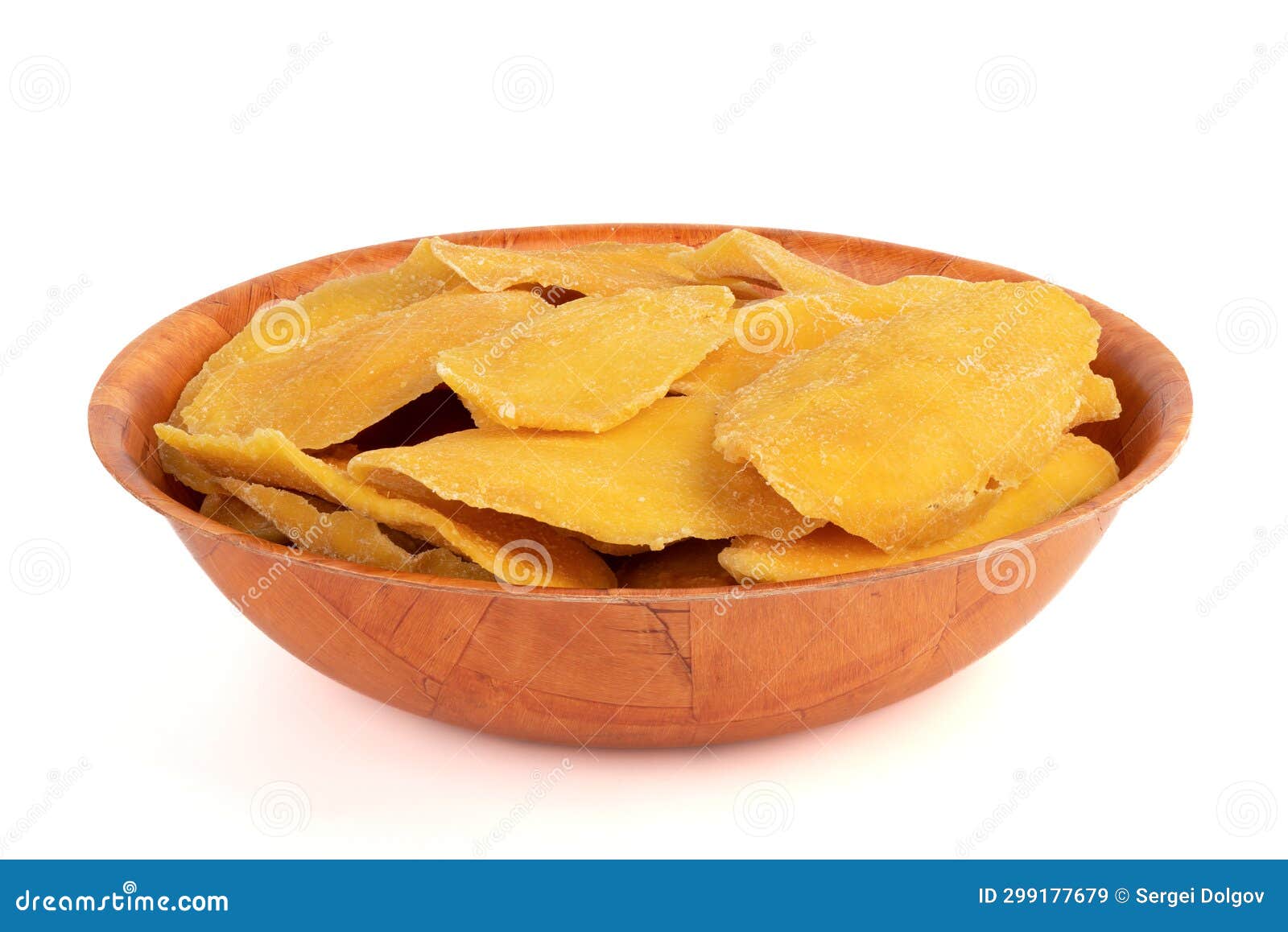 Close-up of Dried Mango Pieces in a Deep Bowl on a White Background ...