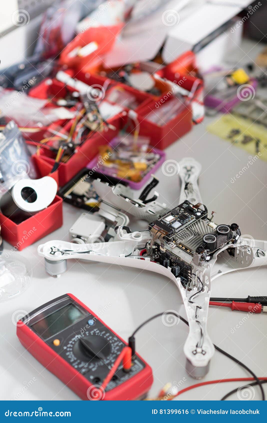 Close Up of Drone Details and Electronic Tester on Table Stock Photo ...
