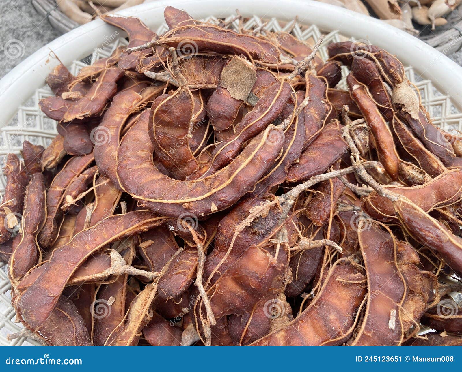Dry tamarind on the ground stock image. Image of tamarind - 245123651