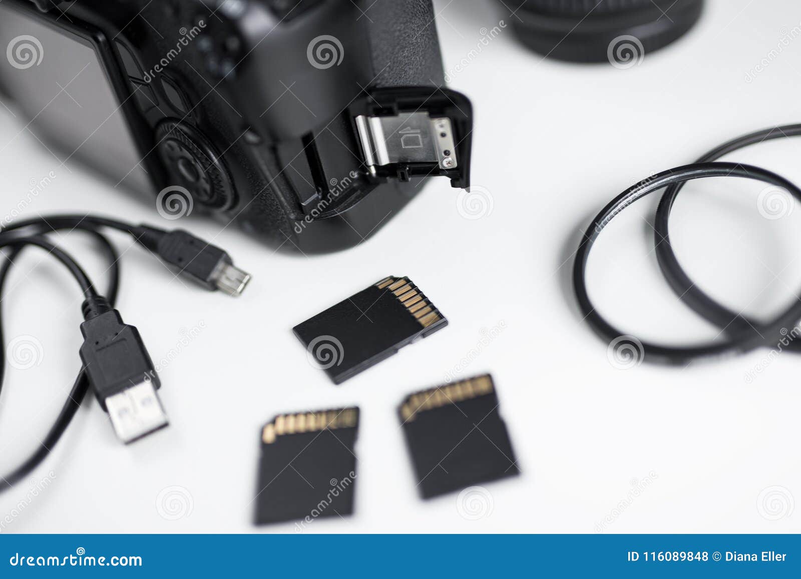 Close Up of Dslr Camera and Sd Memory Card on the Table Stock Photo ...