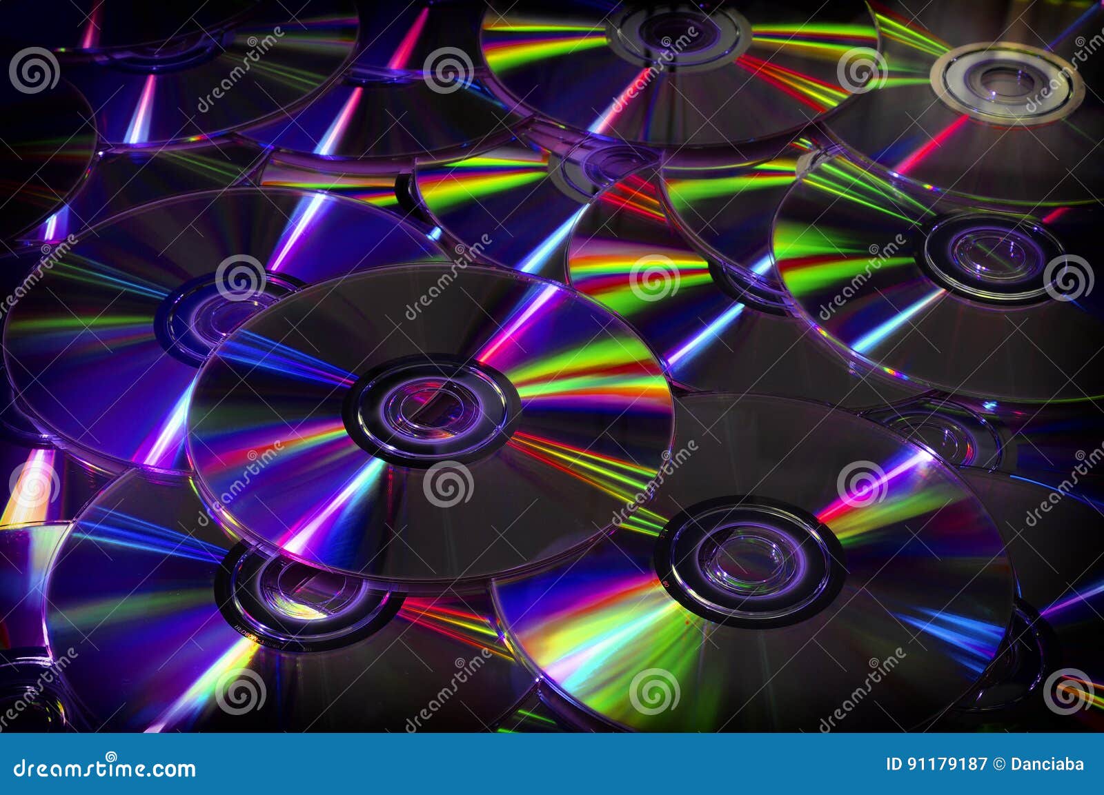 Close up of DVD and CD. stock image. Image of backup - 91179187