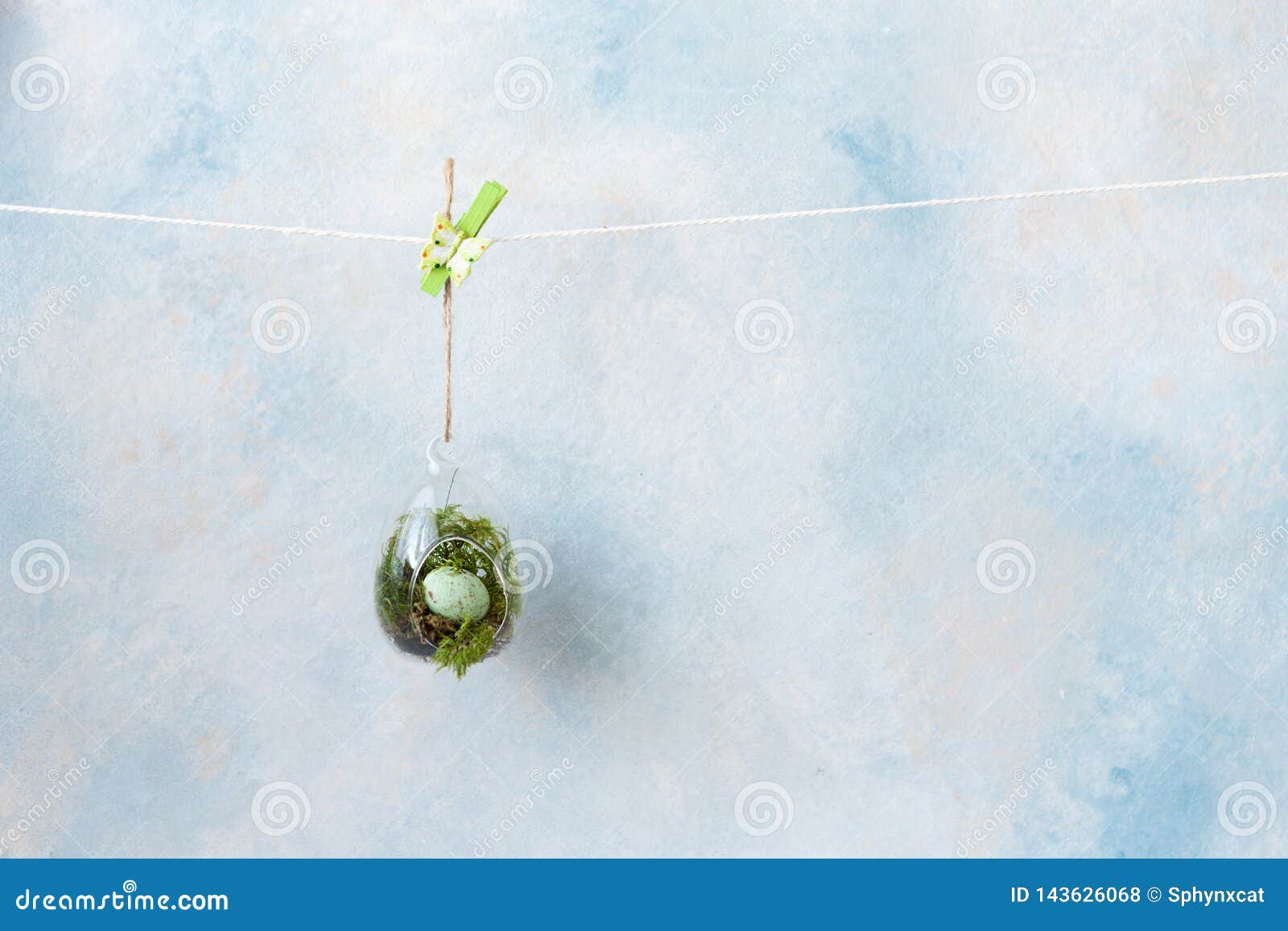 Close Up of Easter Decoration Easter Egg in Glass Egg Hanging on Rope ...