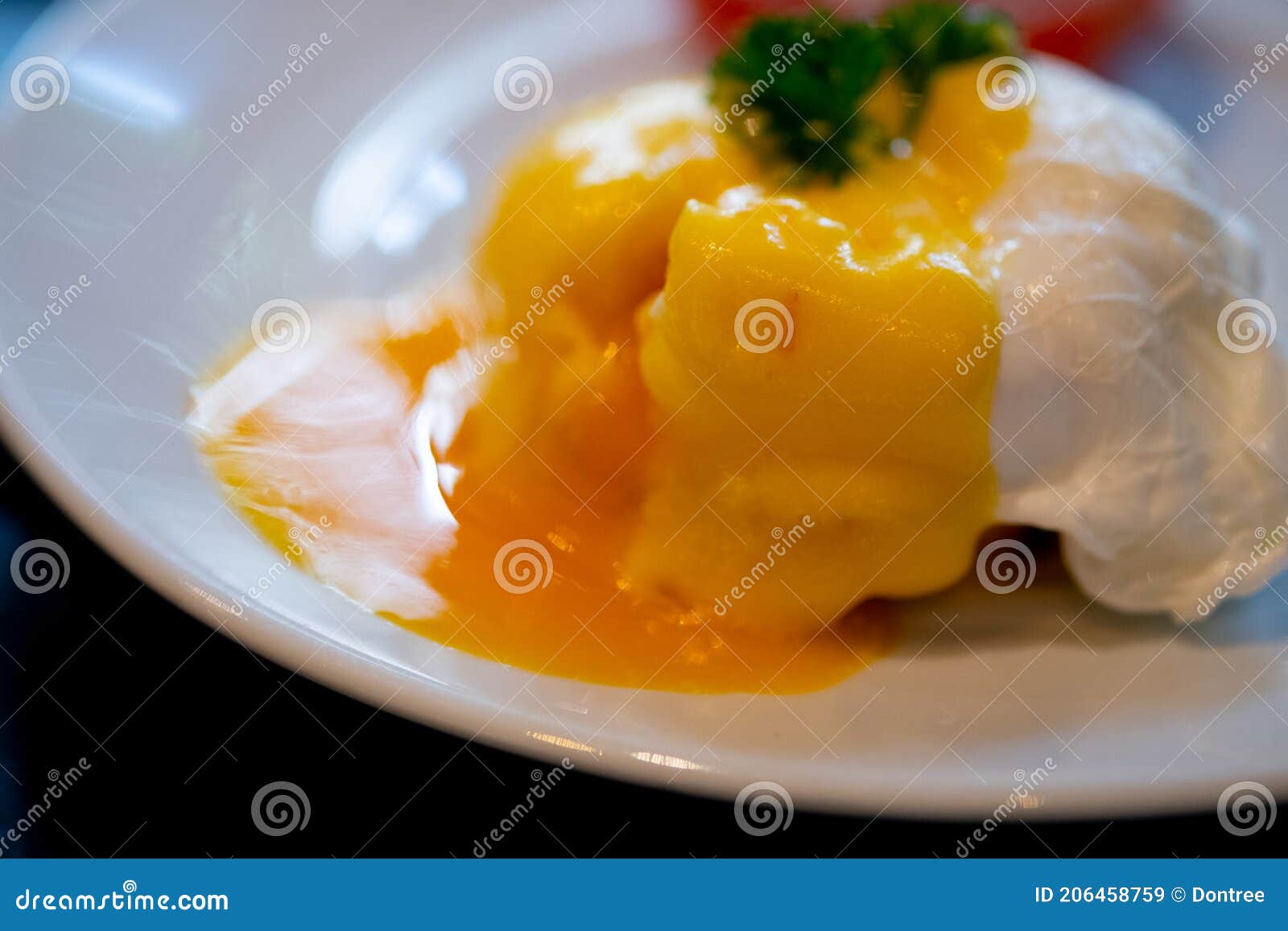 Close Up of Eggs Benedict with Liquid Egg Yolk Running Out Stock Image ...
