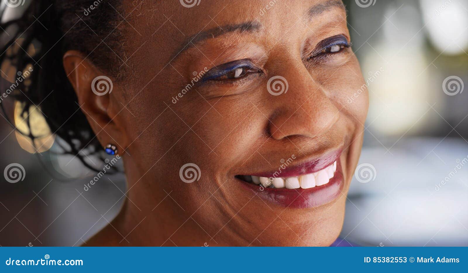 A Close-up of an Elderly Black Woman Looking into the Distance Stock ...