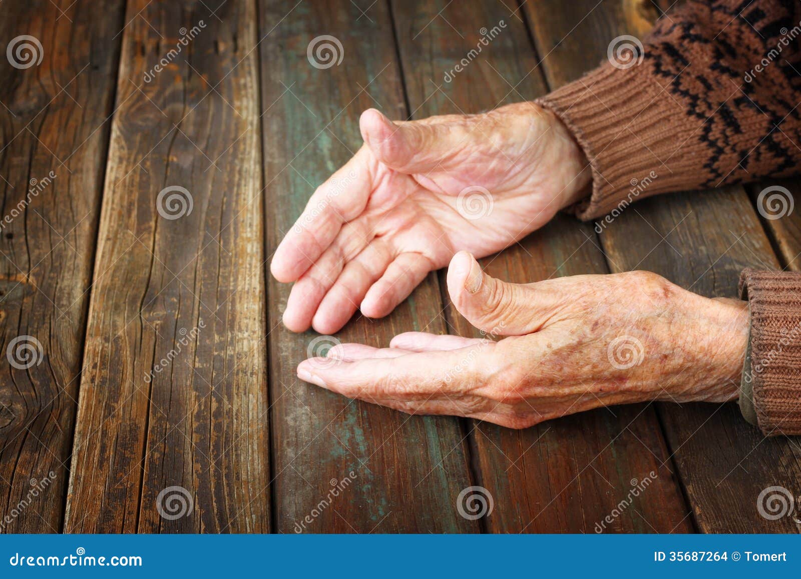 Close Up of Elderly Male Hands on Wooden Table Stock Photo - Image of ...