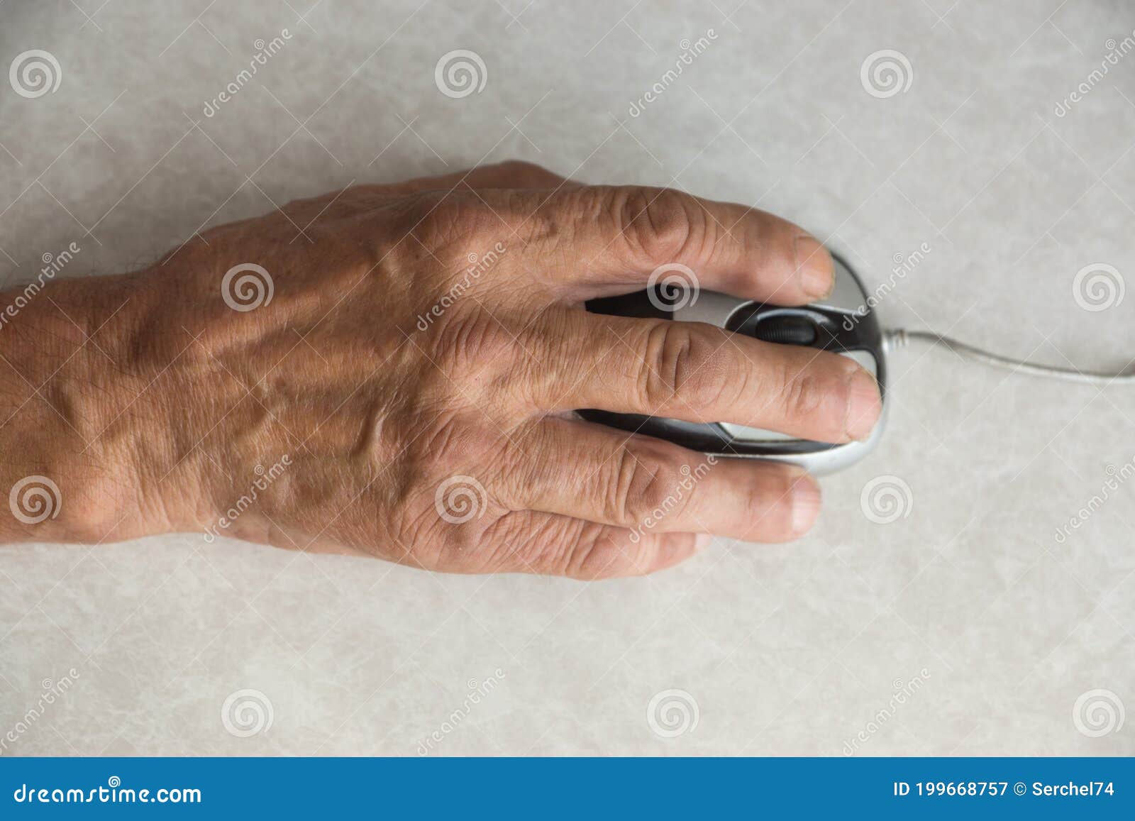 Close-up of an Elderly Man`s Hand on a Computer Mouse. Older People are ...