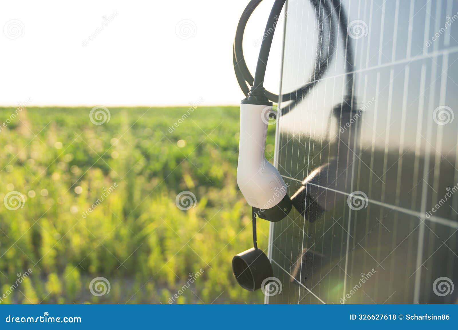 Close Up of Electric Car Charging Plug with Solar Panel Stock Photo ...