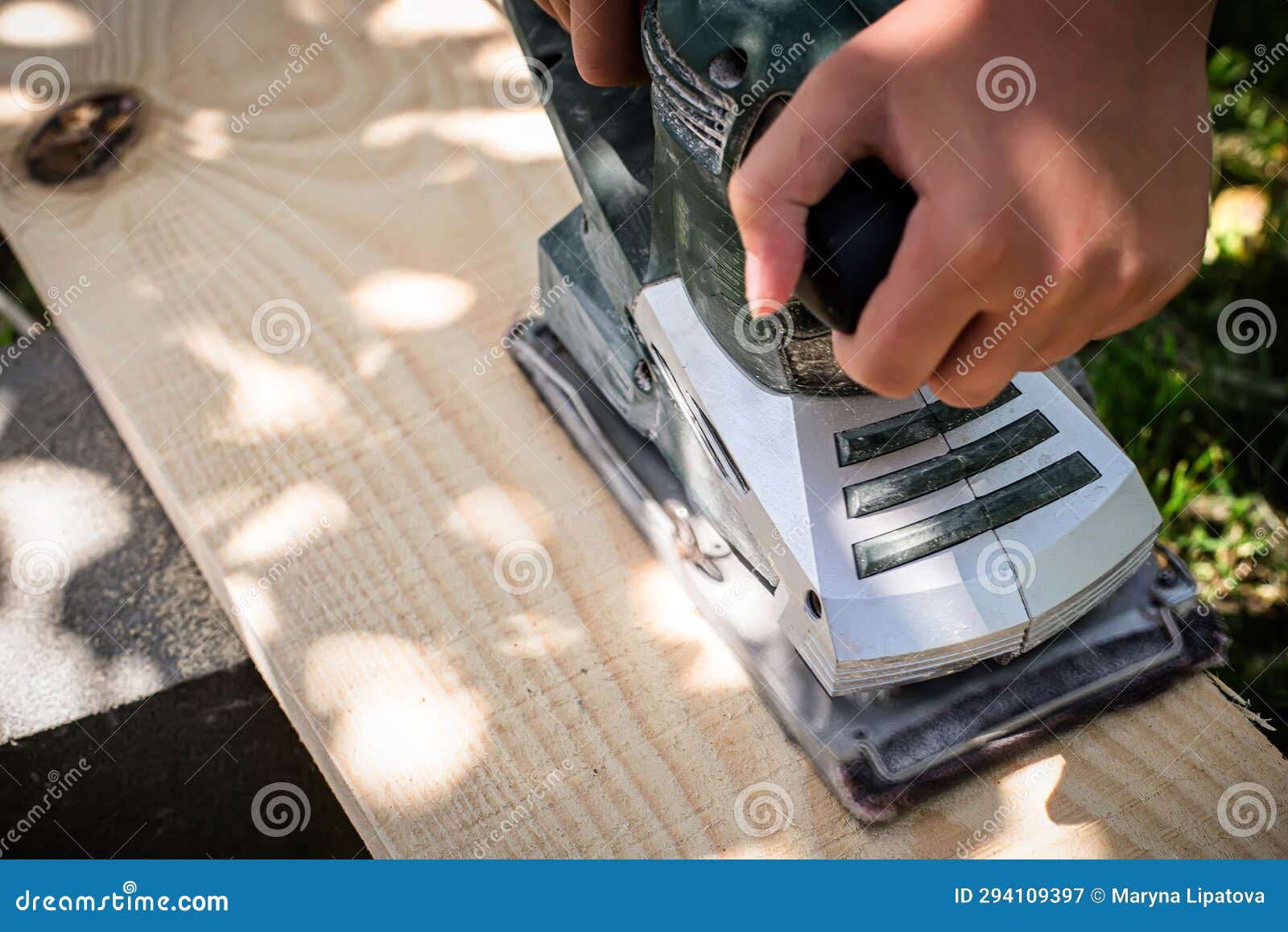 Close-up of an Electric Planer in Operation, Creating a Smooth Finish ...