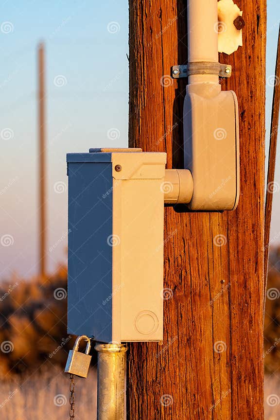 Close Up of an Electrical Box on a Telephone Pole Stock Image - Image ...