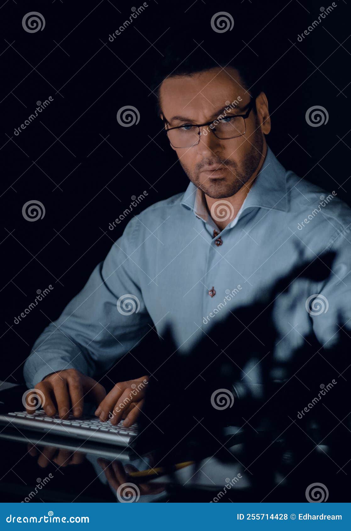 Close Up.employees Work on Computers in a Dark Office Stock Photo ...