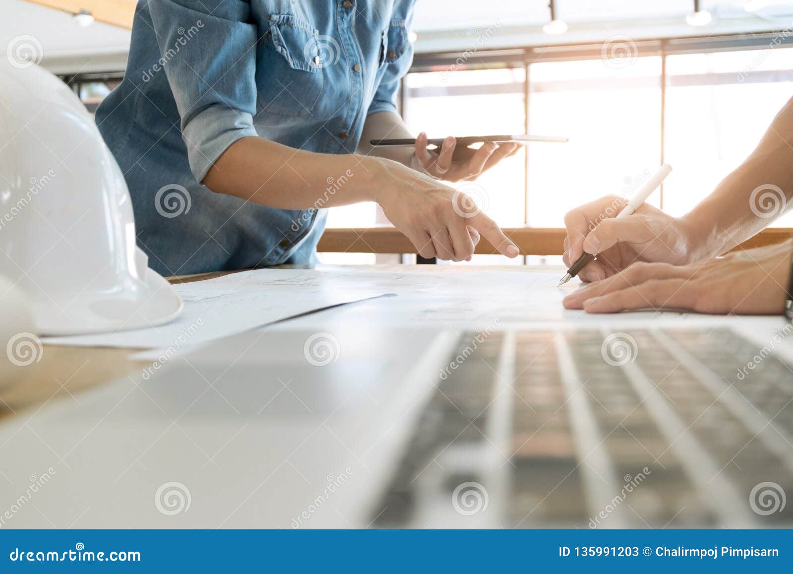Close Up of Engineer Hands Discussing a Building Construction Project ...