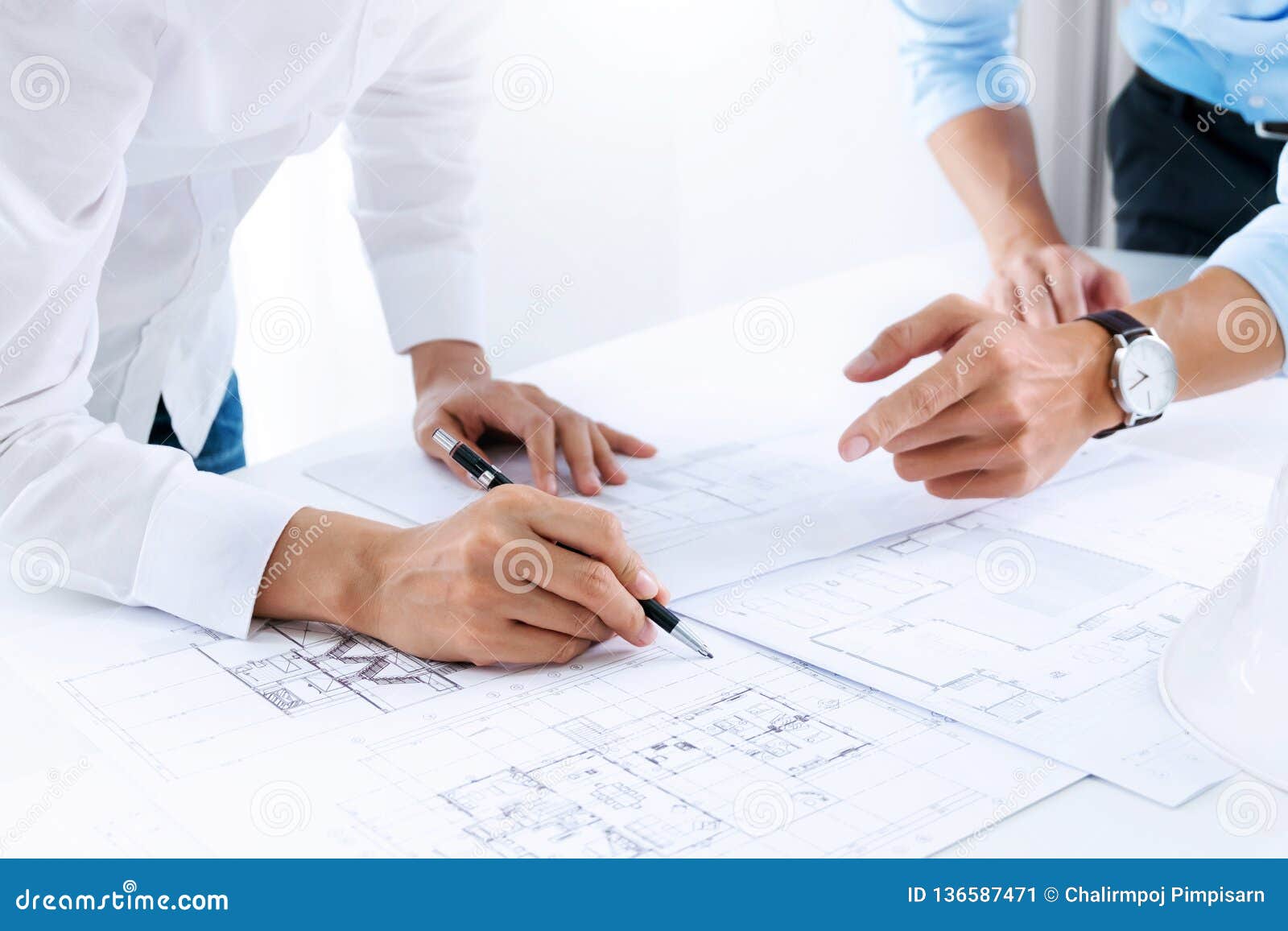 Close Up of Engineer Hands Discussing a Building Construction Project ...