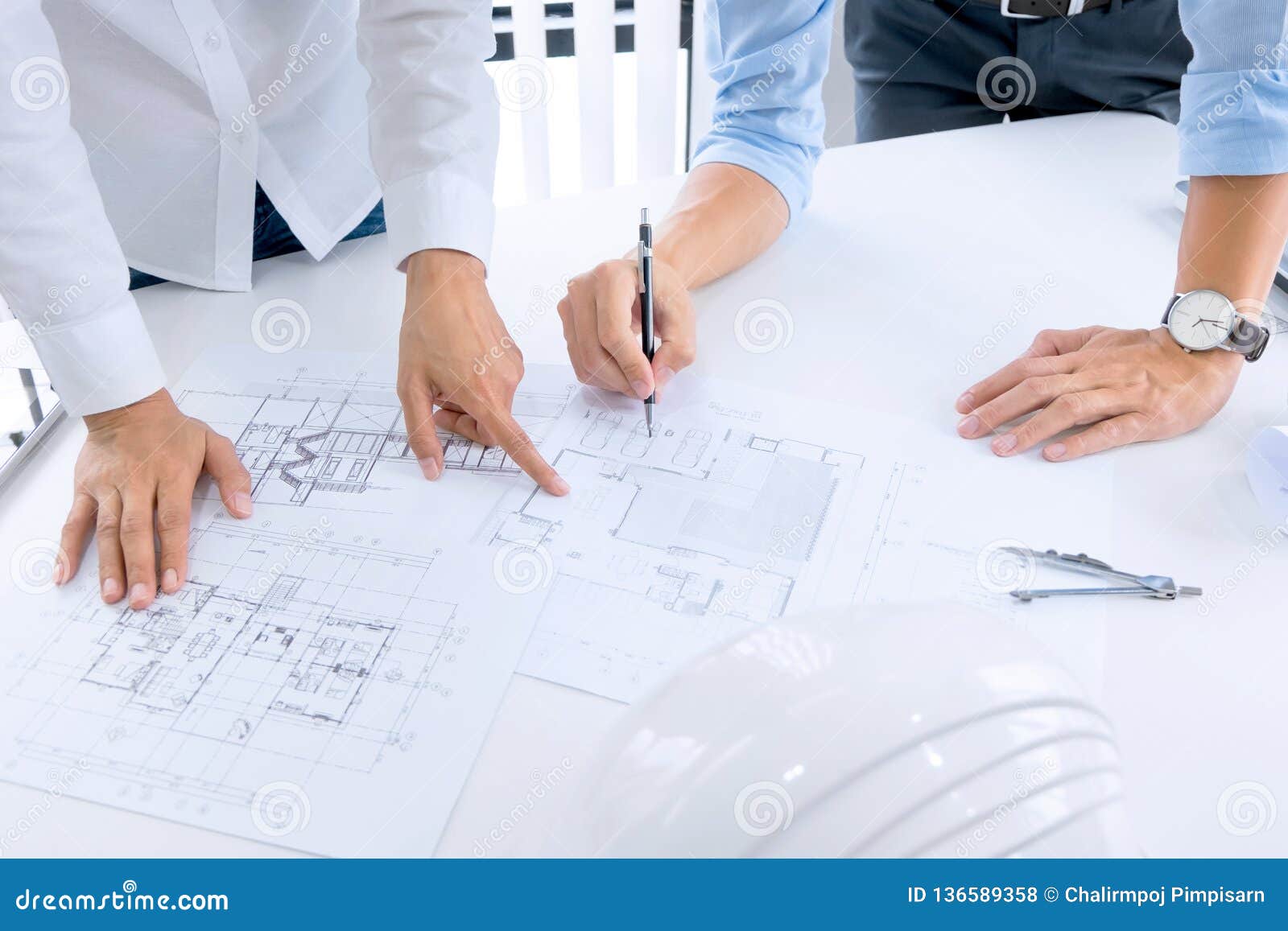 Close Up of Engineer Hands Discussing a Building Construction Project ...