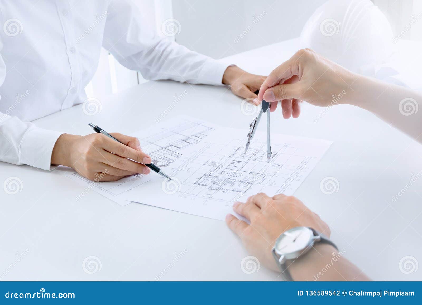 Close Up of Engineer Hands Discussing a Building Construction Project ...