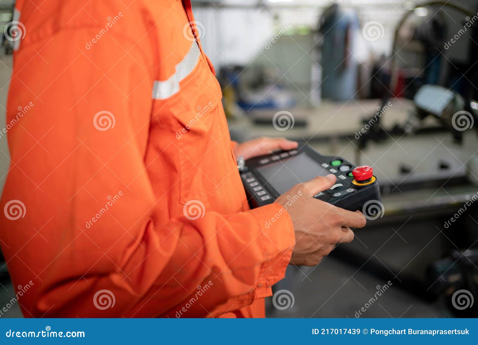 Close Up of Engineer Man in Uniform Using Remote Control Robotic Arm ...