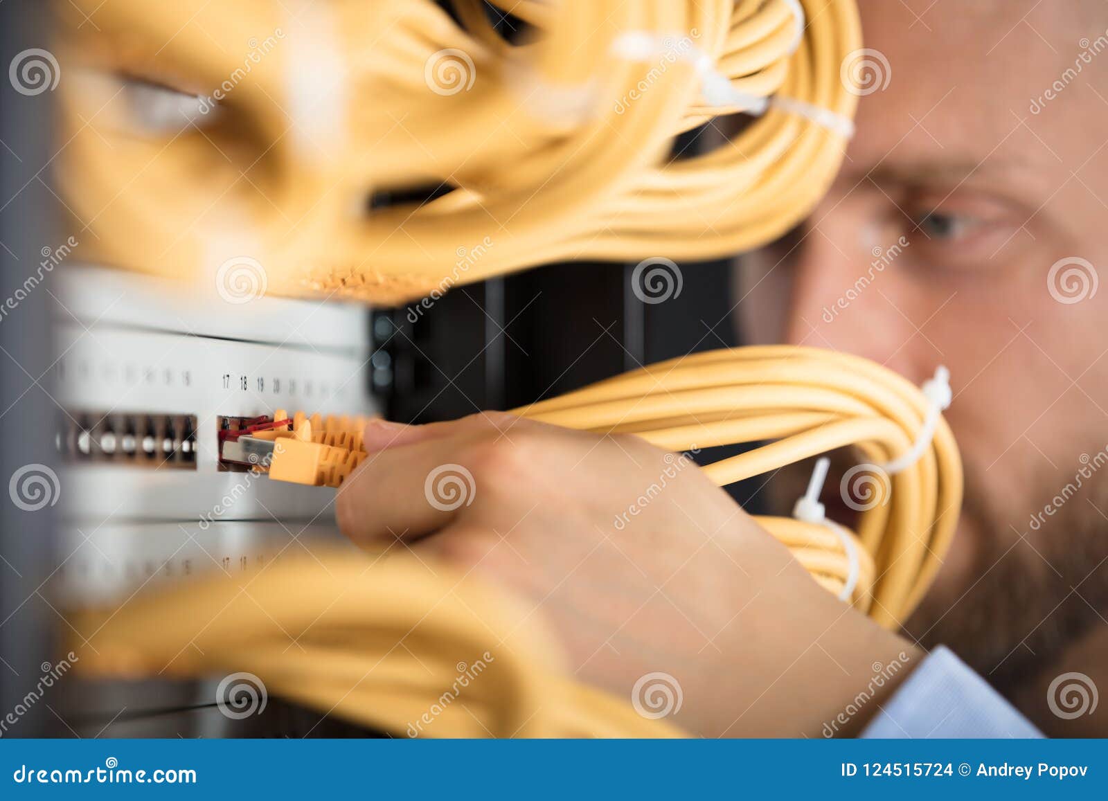 Engineer Plugging Cables into Server Stock Photo - Image of digital ...