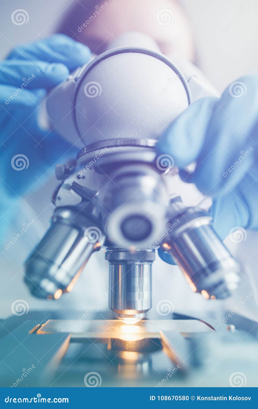 Close Up of Examining of Test Sample Under the Microscope Stock Photo ...