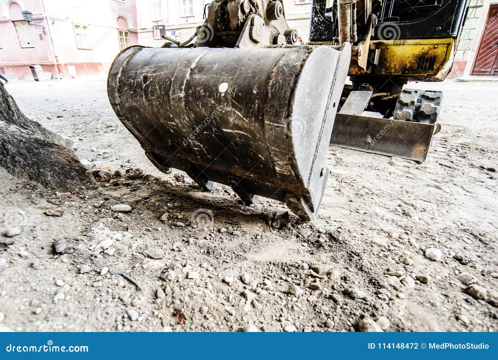 Close up excavator digging stock photo. Image of machinery - 114148472
