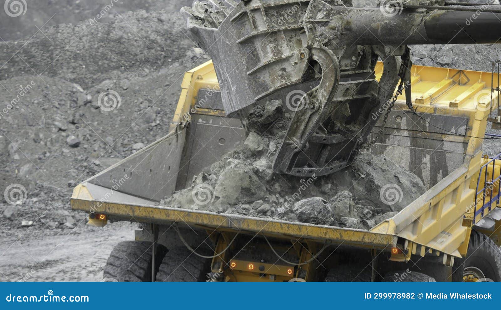 Close-up of Excavator Loading the Dumper with Ore in the Quarry. Mining ...