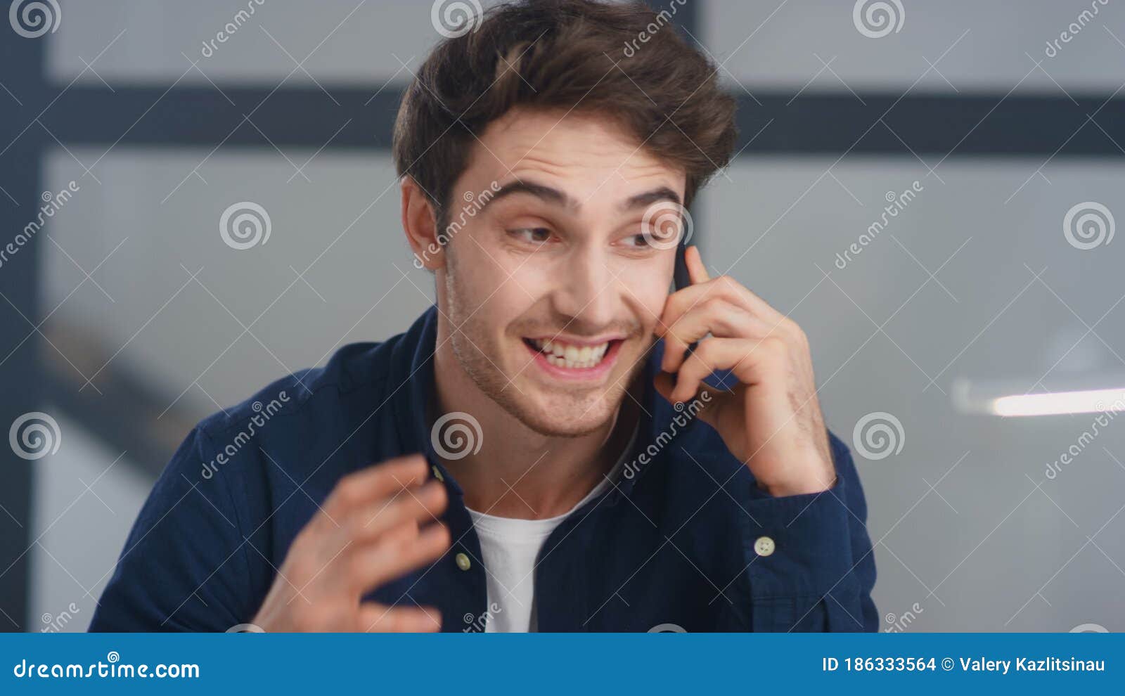 Portrait Of Positive Guy Supporting Client On Phone Man Making Winner